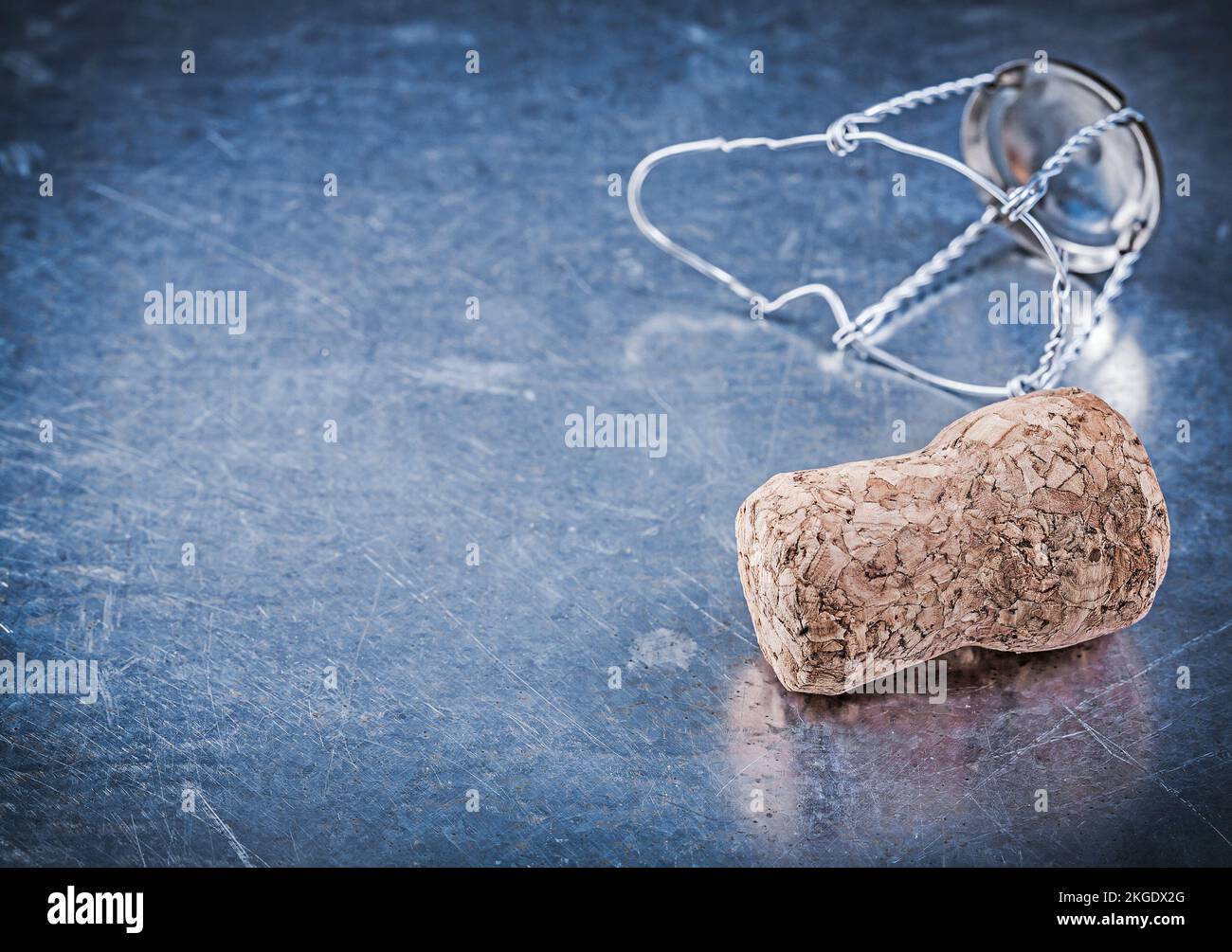 Cork plug with twisted wire on metallic background Stock Photo - Alamy
