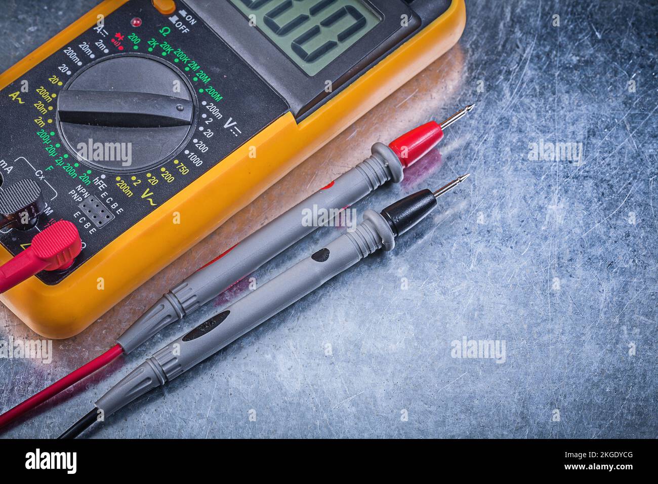 Digital electric tester on metallic surface horizontal view electricity ...