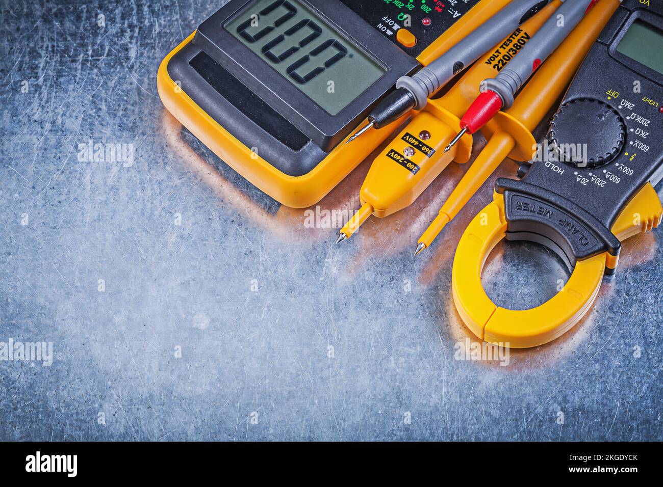 Digital ammeter electrical tester multimeter on metallic background ...