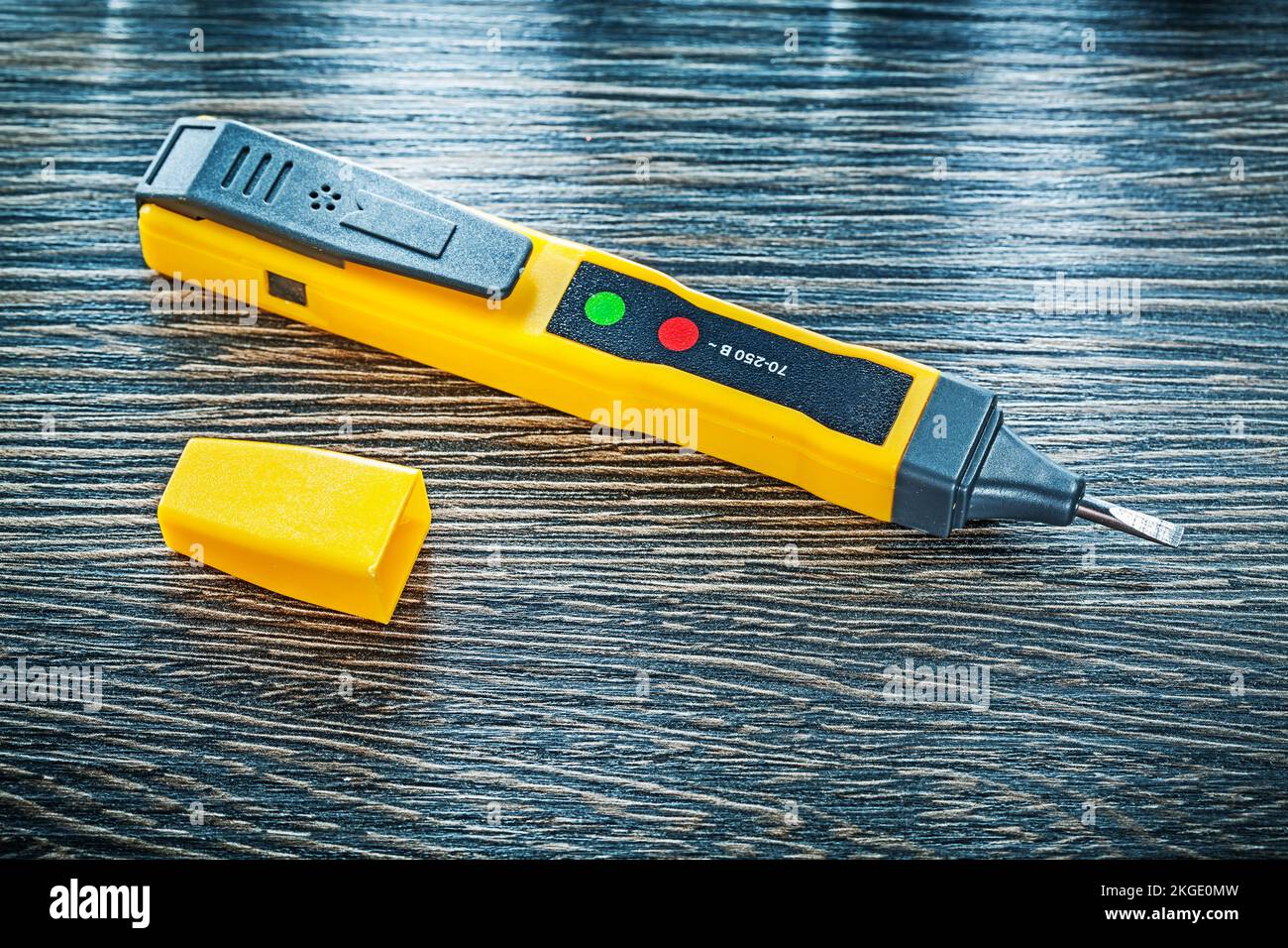 Electric tester on wood board horizontal image electricity concept ...