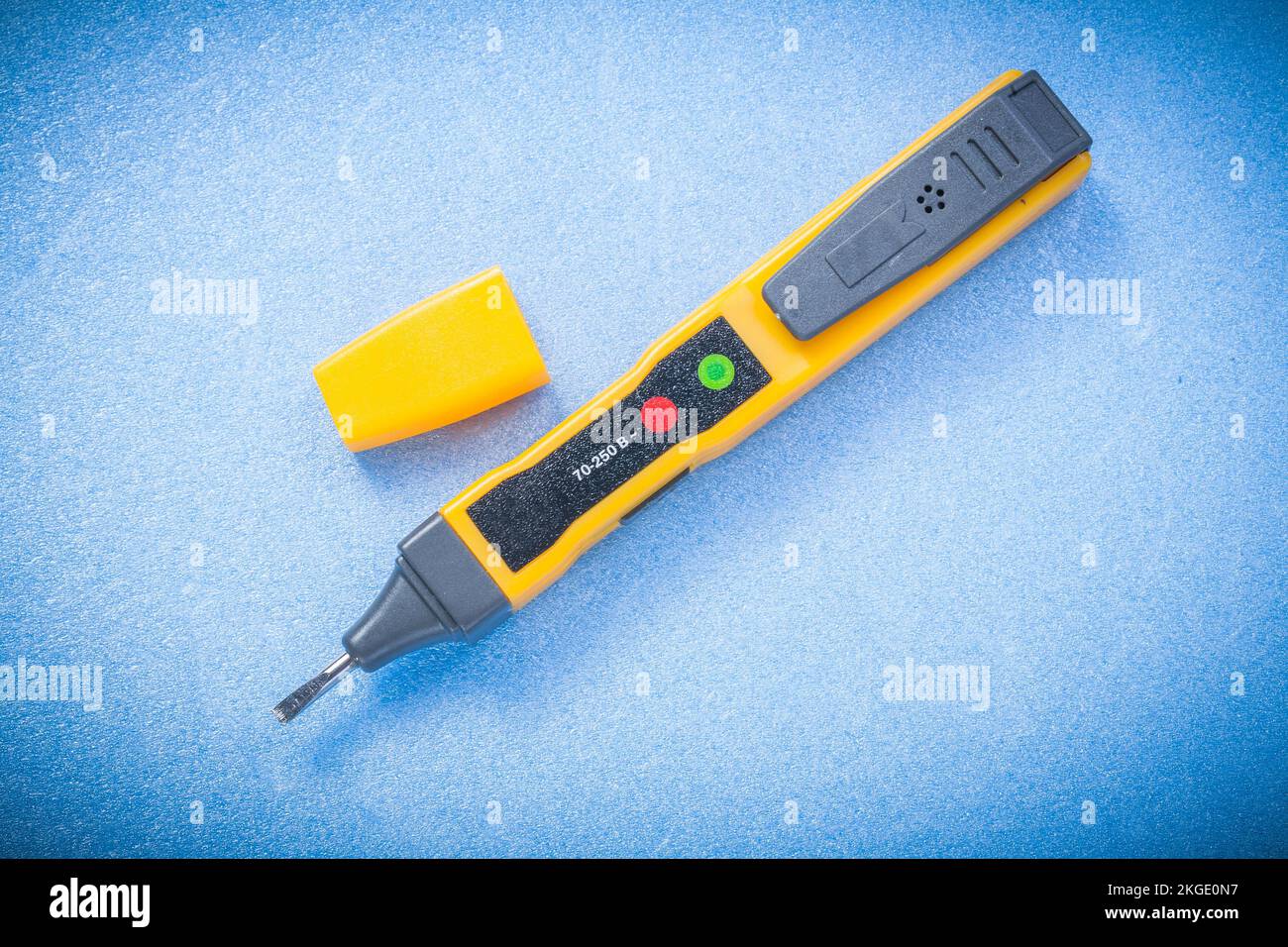 Electric tester indicator on blue background electricity concept Stock ...