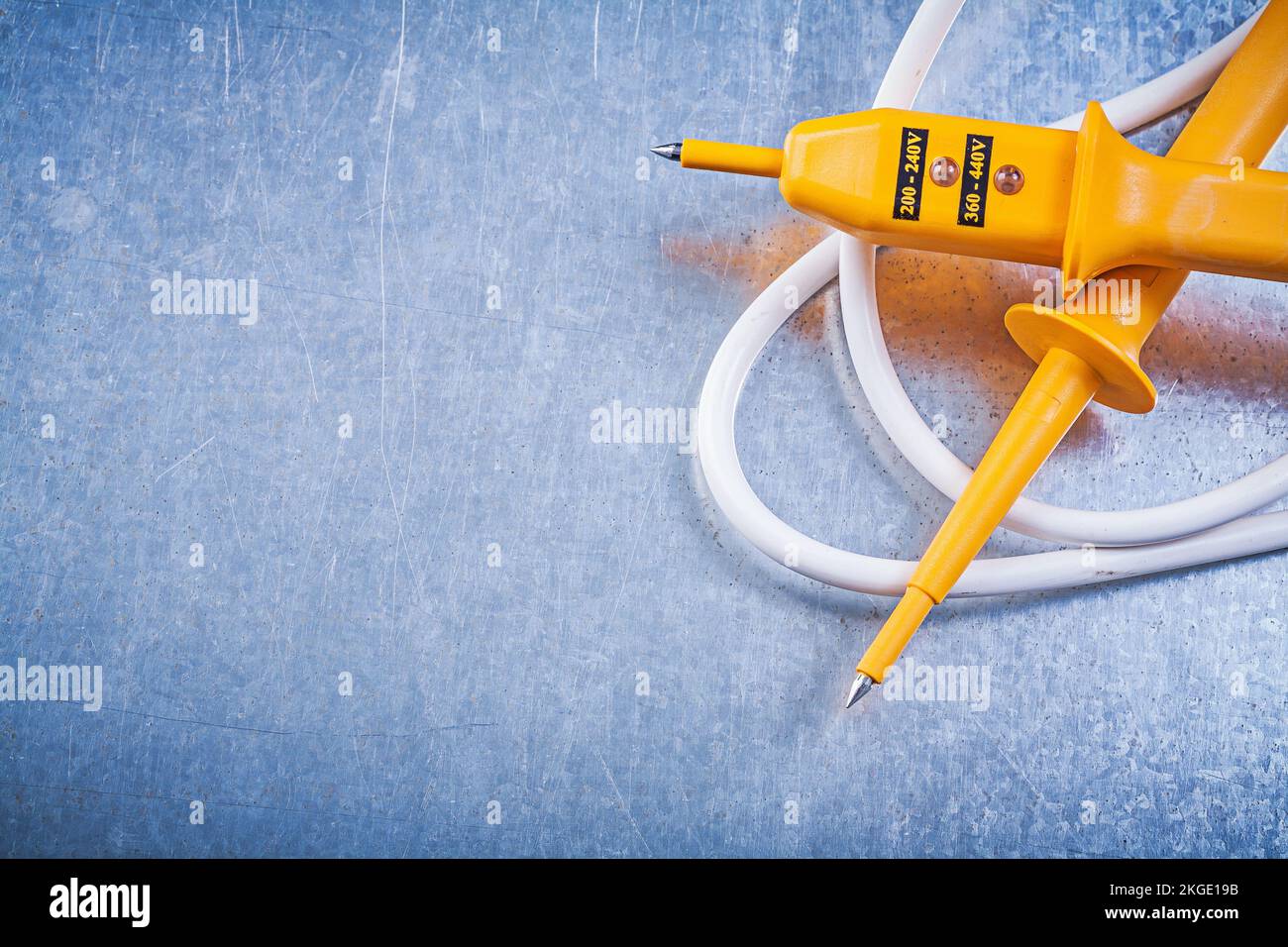 Electrical tester on metallic background electricity concept Stock ...