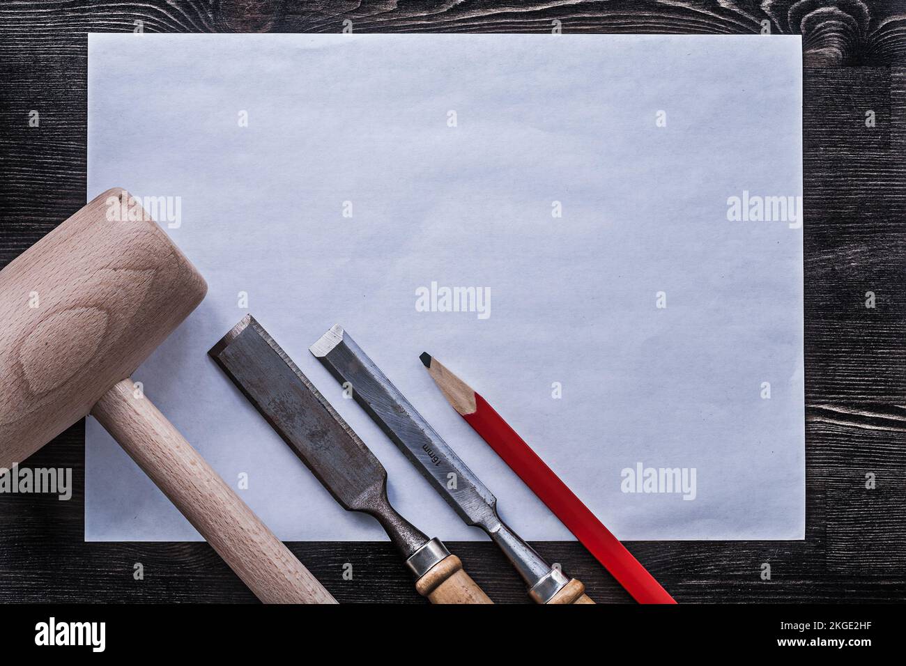 Firmer chisels wooden hammer pencil clean paper construction concept ...
