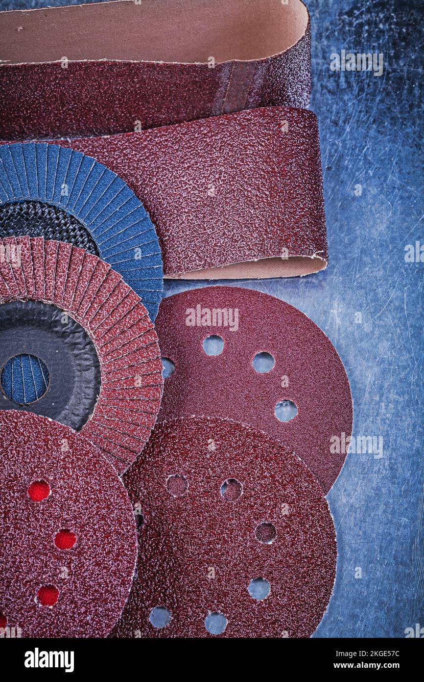 Glass-paper abrasive discs flap grinding wheels on metallic background ...