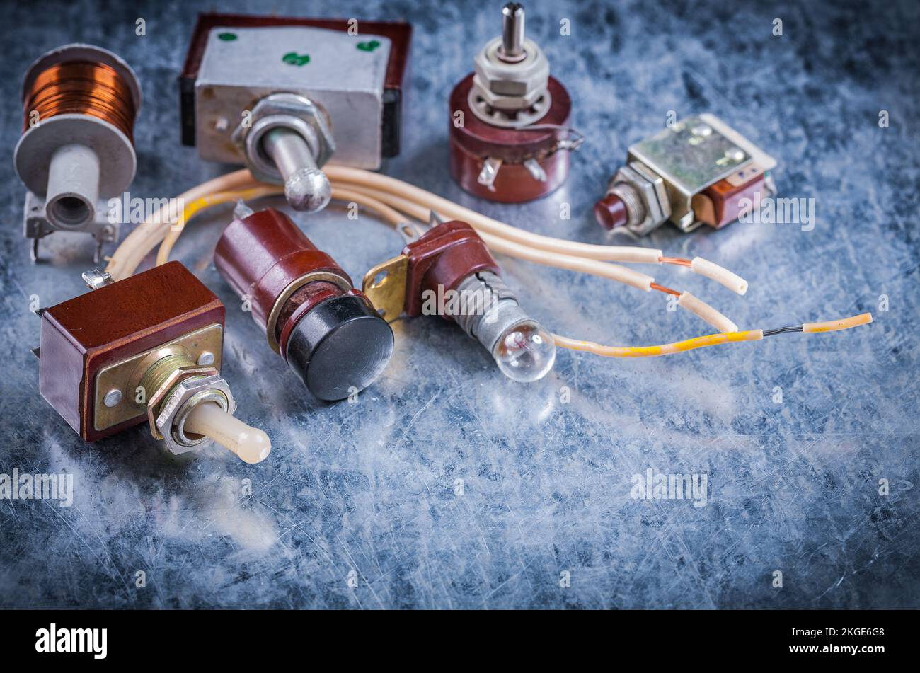 Group of vintage electrical equipment on metallic background ...