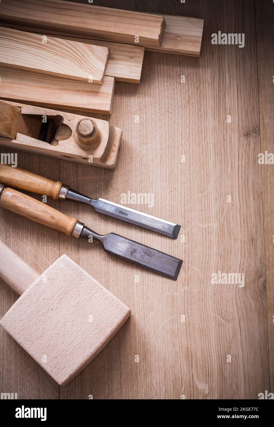 Group of wooden joiner’s working tools on wood board close up view ...