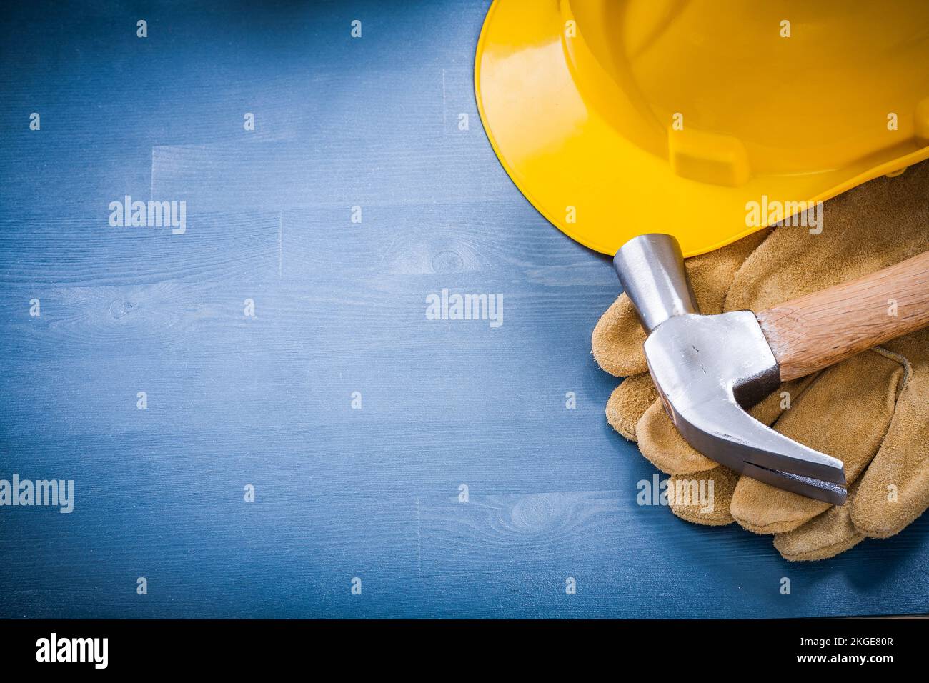 Hard hat claw hammer protective gloves copy space construction concept ...