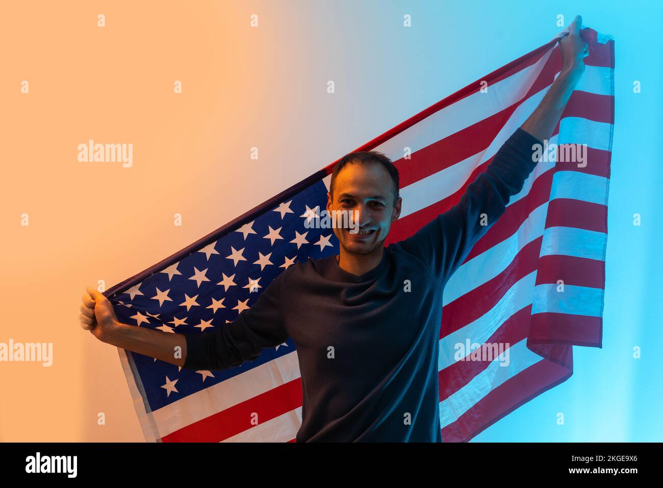 Person holding waving usa flag hi-res stock photography and images - Alamy