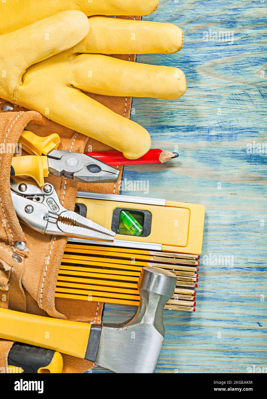 Leather building belt with construction tooling on wood board ...