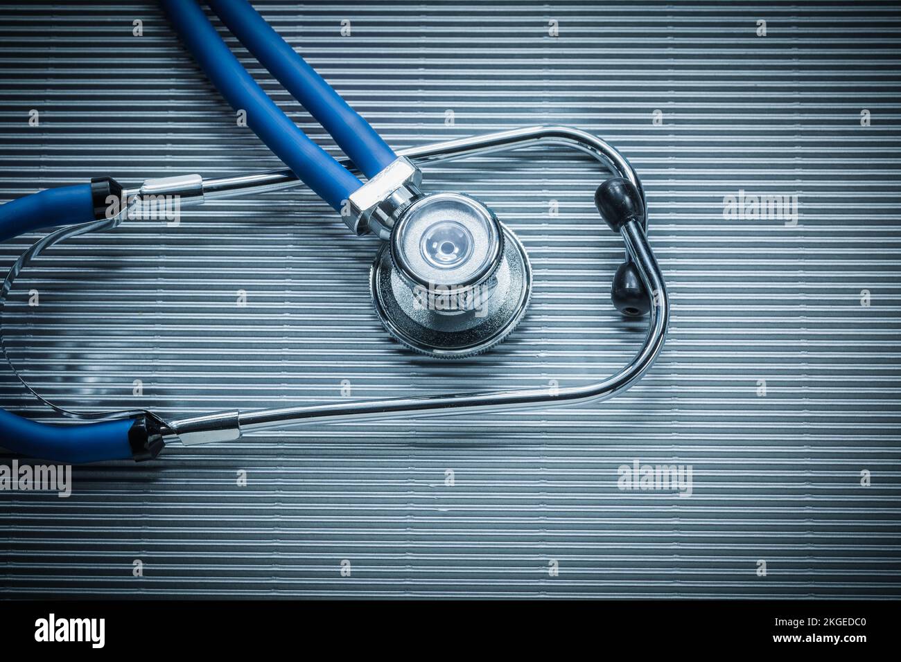 Medical auscultoscope on striped background top view Stock Photo - Alamy