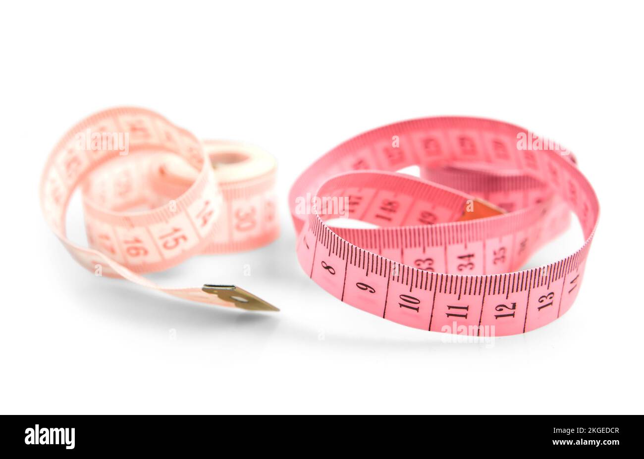 Inch scale pink measuring tape hi-res stock photography and images - Alamy