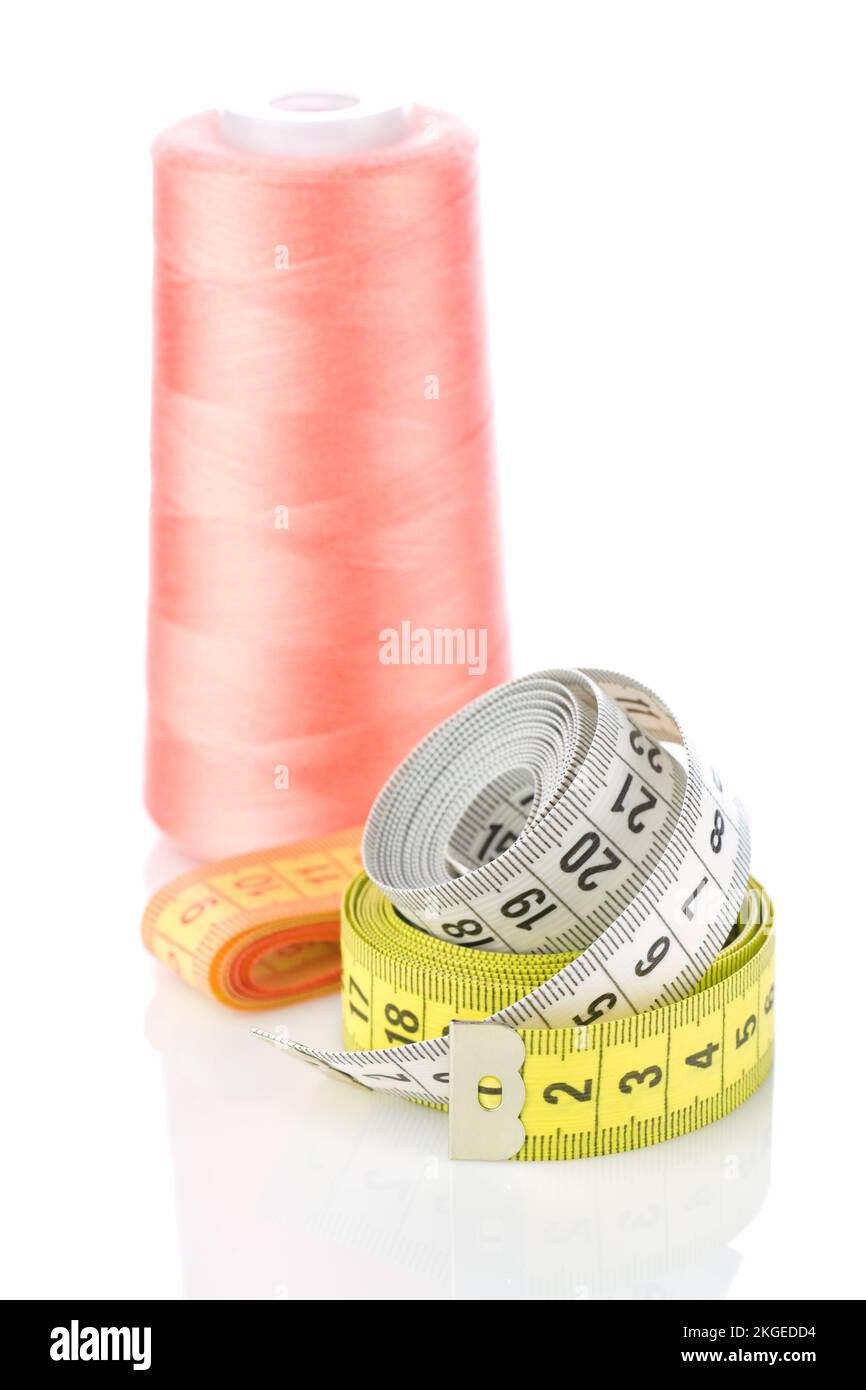 measure tapes and thread Stock Photo - Alamy