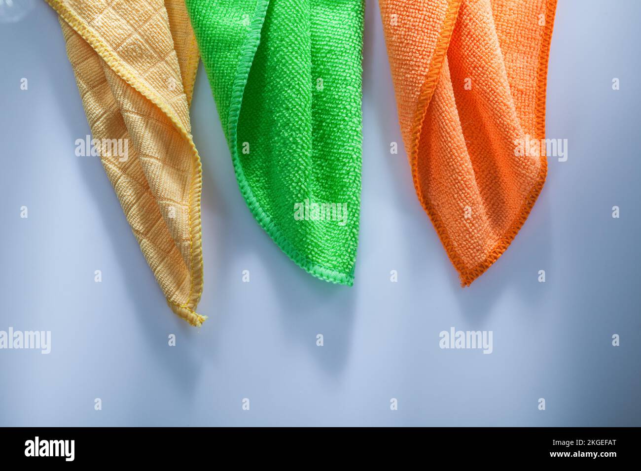 New household cleaning rags on white background Stock Photo - Alamy