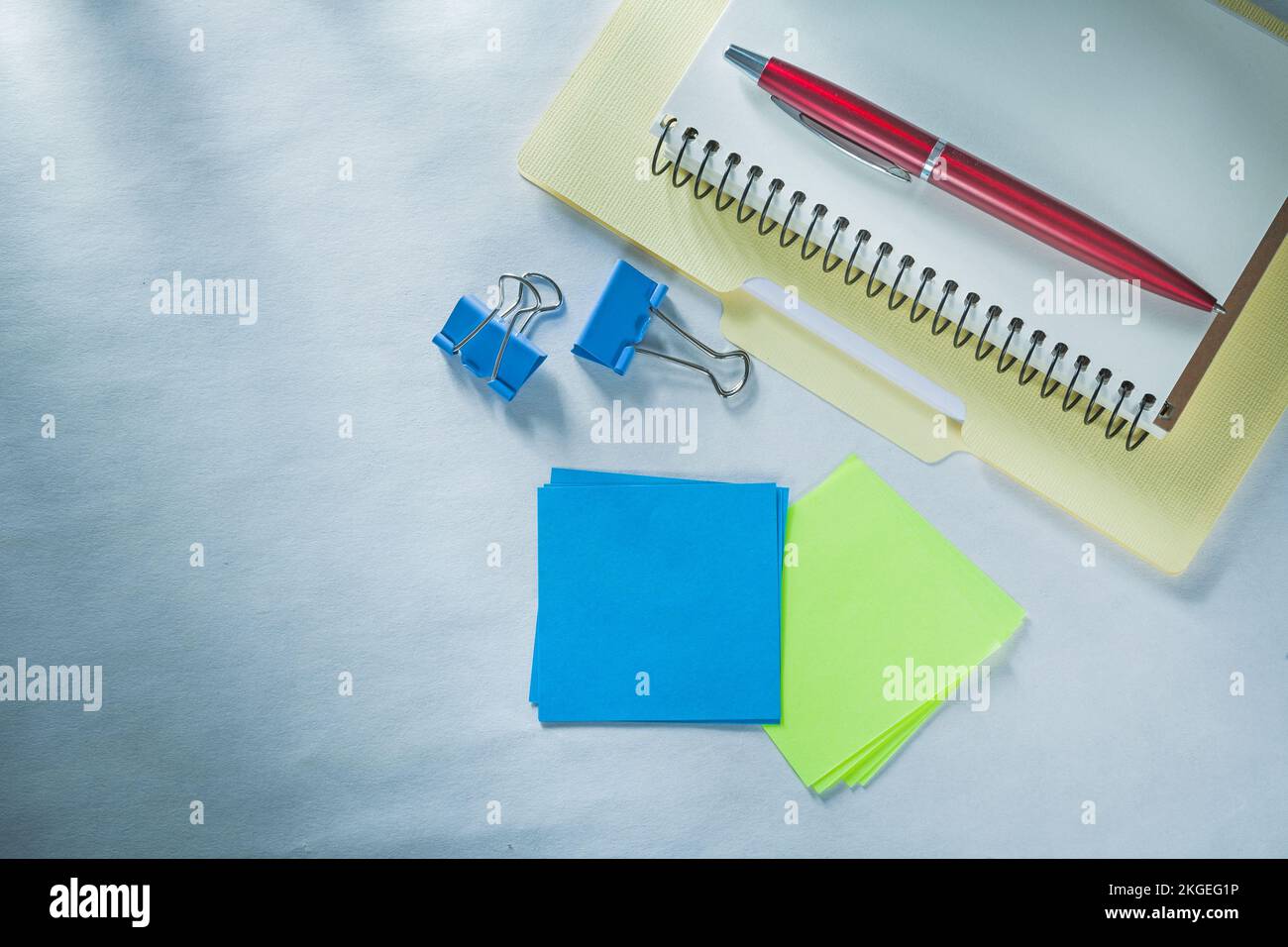 Note-book paper folder biro pen document clips sticky reminders Stock ...