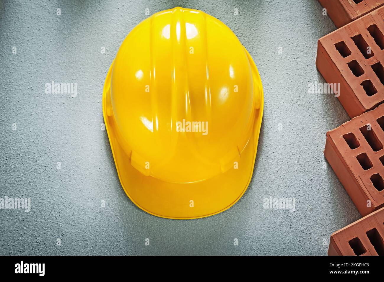 Orange bricks safety cap on concrete surface top view construction ...