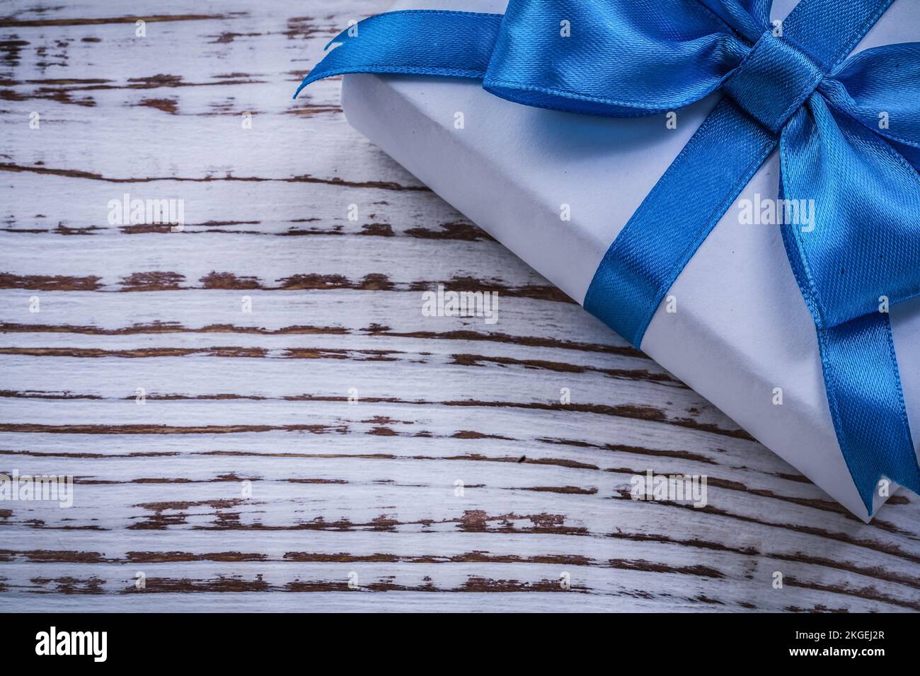 Packaged present box on vintage wooden board holidays concept Stock ...