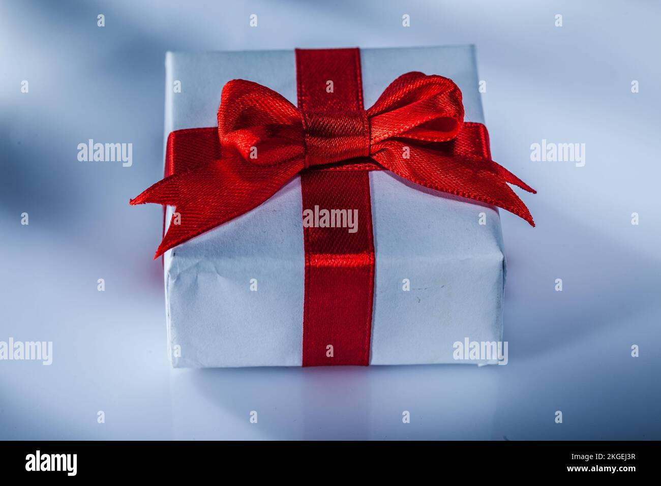 Packed red present box on white background Stock Photo - Alamy