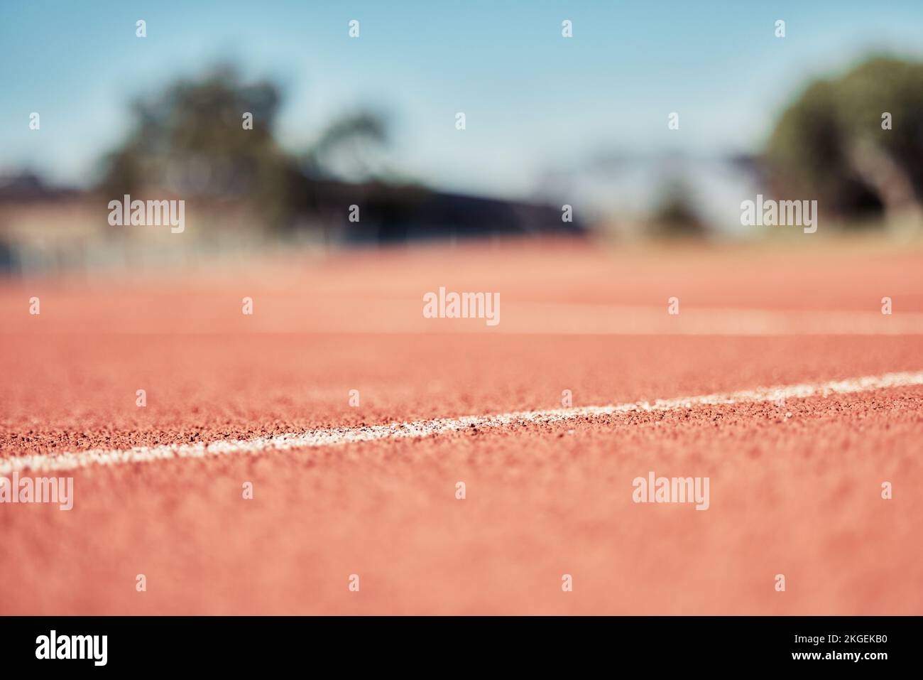 Stadium, clay running track and closeup of outdoor arena or sport pitch ...
