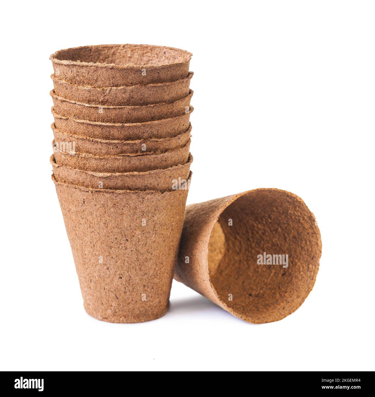 Peat pots isolated over white Stock Photo - Alamy