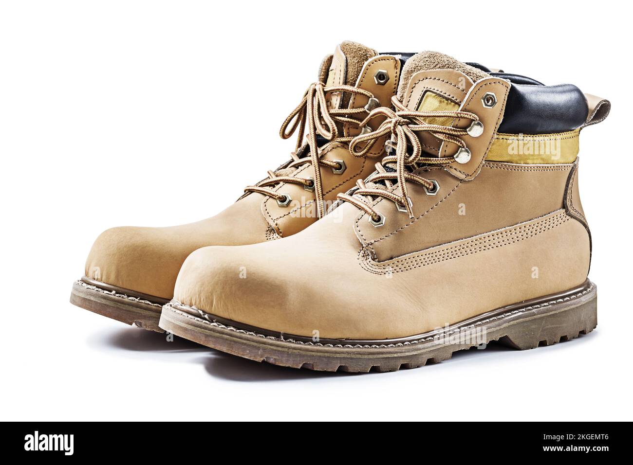 pair of working boots isolated on white Stock Photo - Alamy