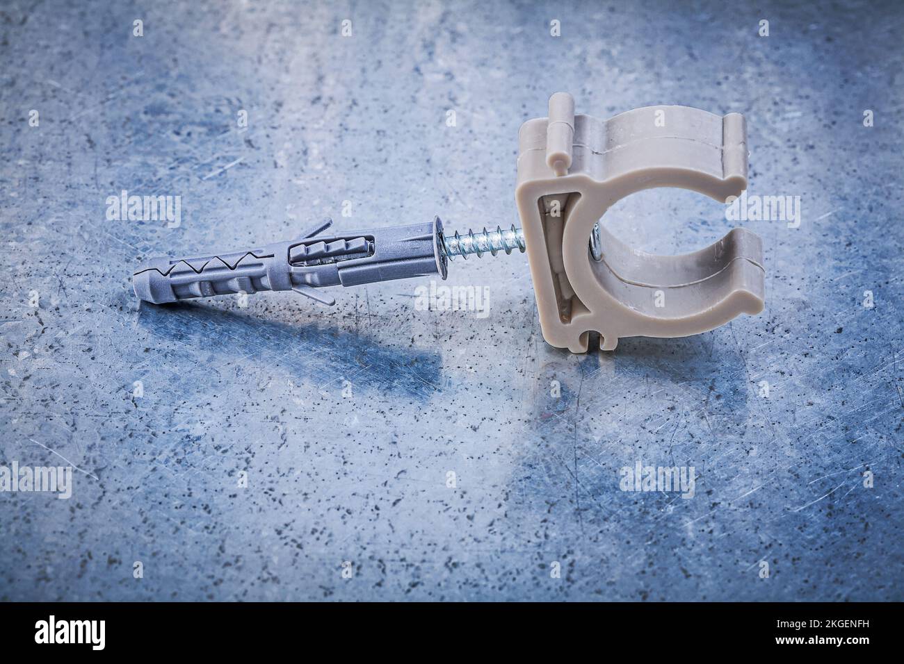 Pipe clamp on metallic background horizontal view construction concept ...