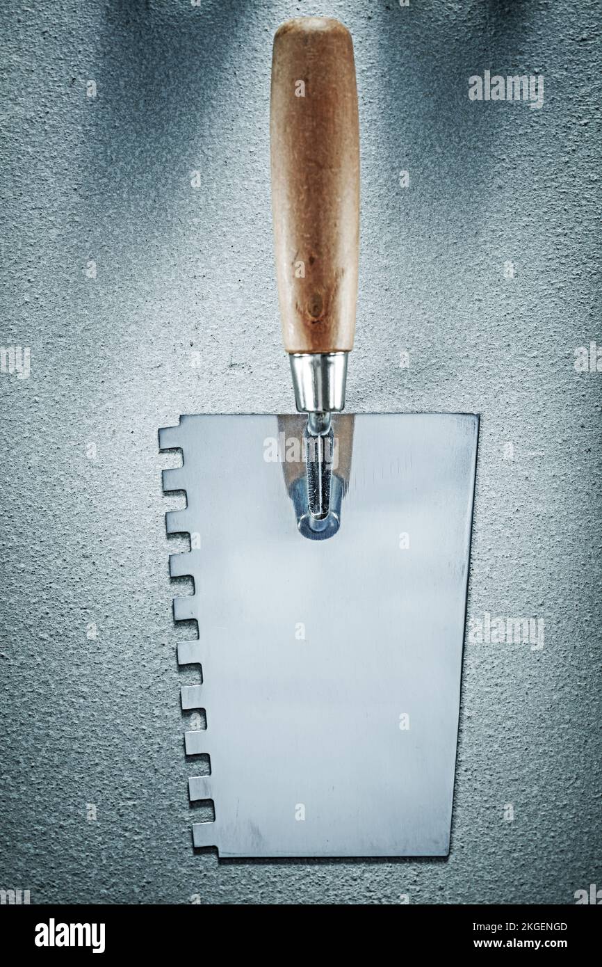 Plastering trowel on concrete surface top view construction concept ...