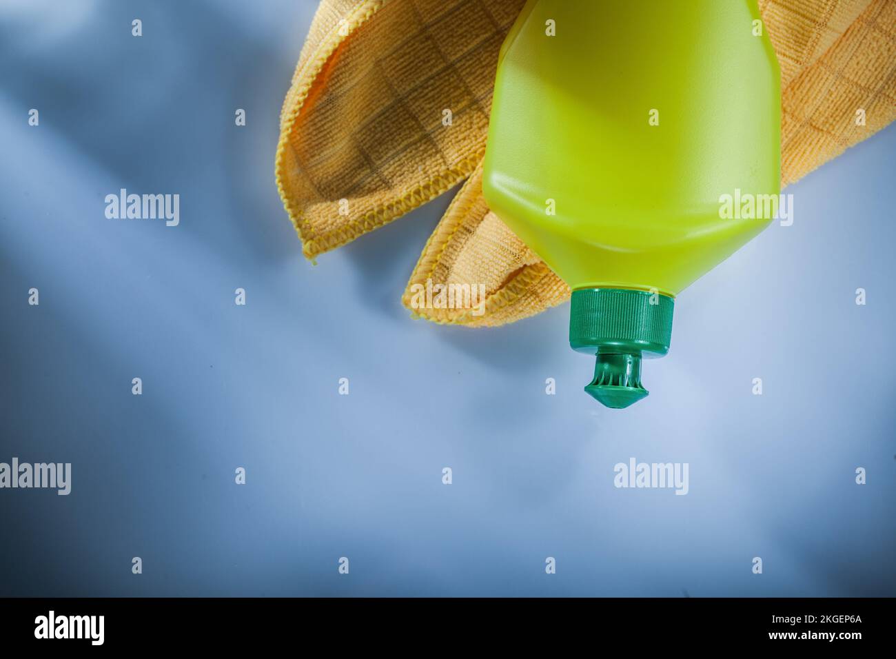 Plastic bottle washing cloth on white background Stock Photo - Alamy