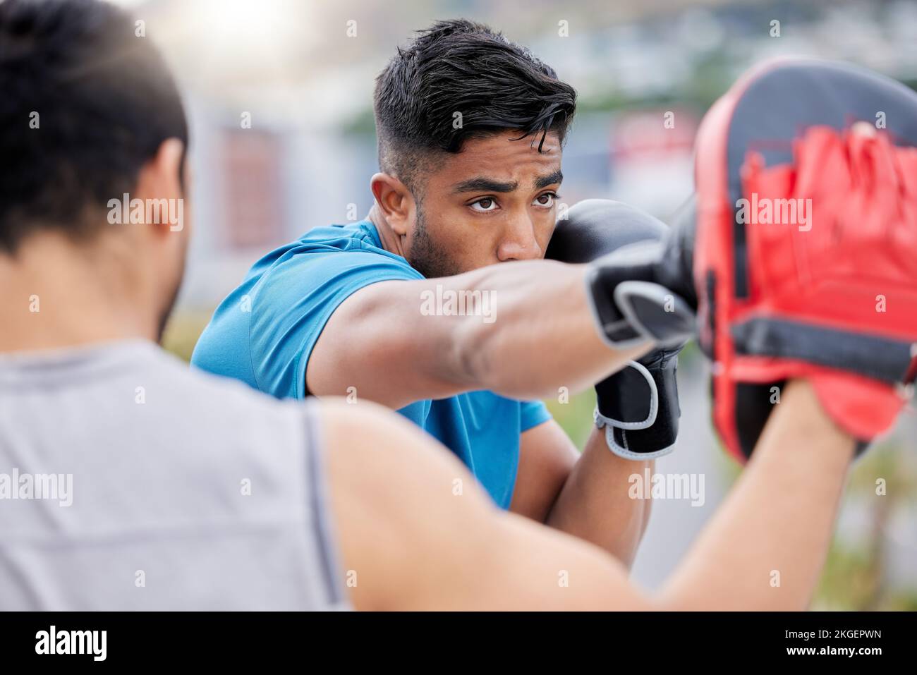 Boxing, fitness and athlete with personal trainer, men together, fight ...