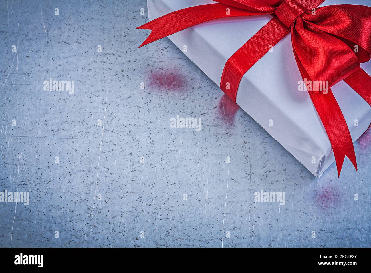Present box on scratched metallic background holidays concept Stock ...