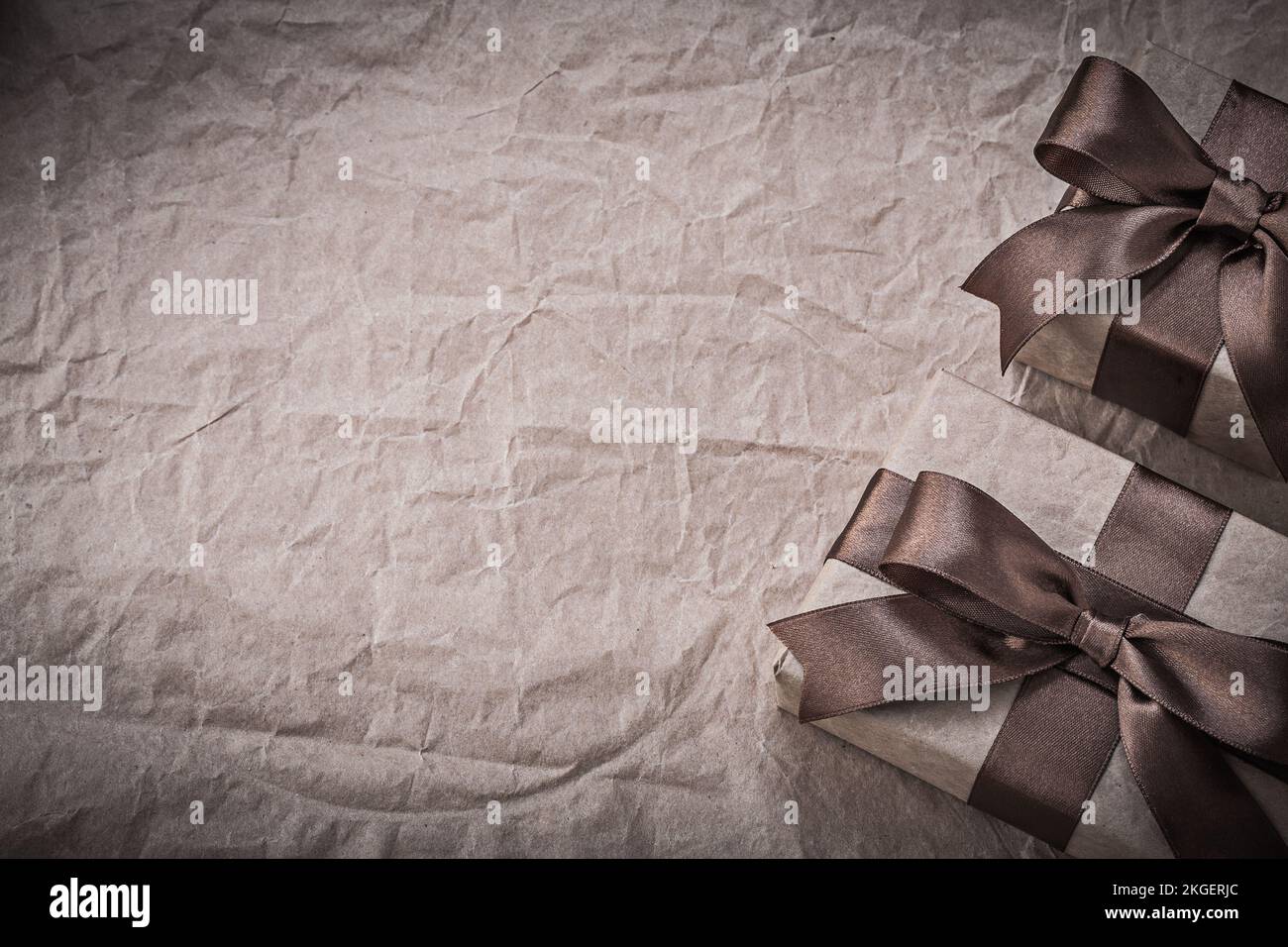 Present boxes on wrapping paper horizontal version holidays concept ...