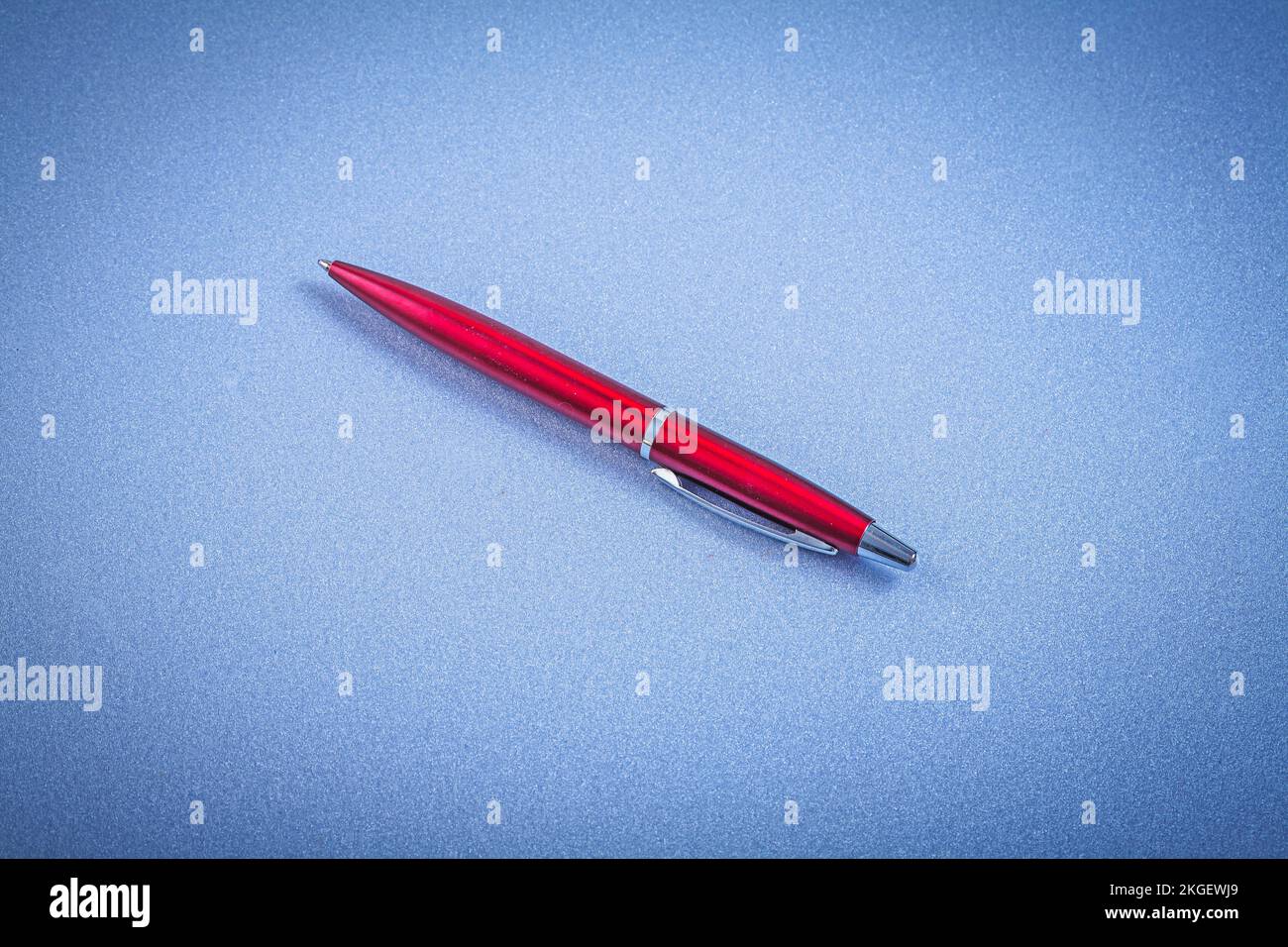 Red biro pen horizontal view office concept Stock Photo - Alamy