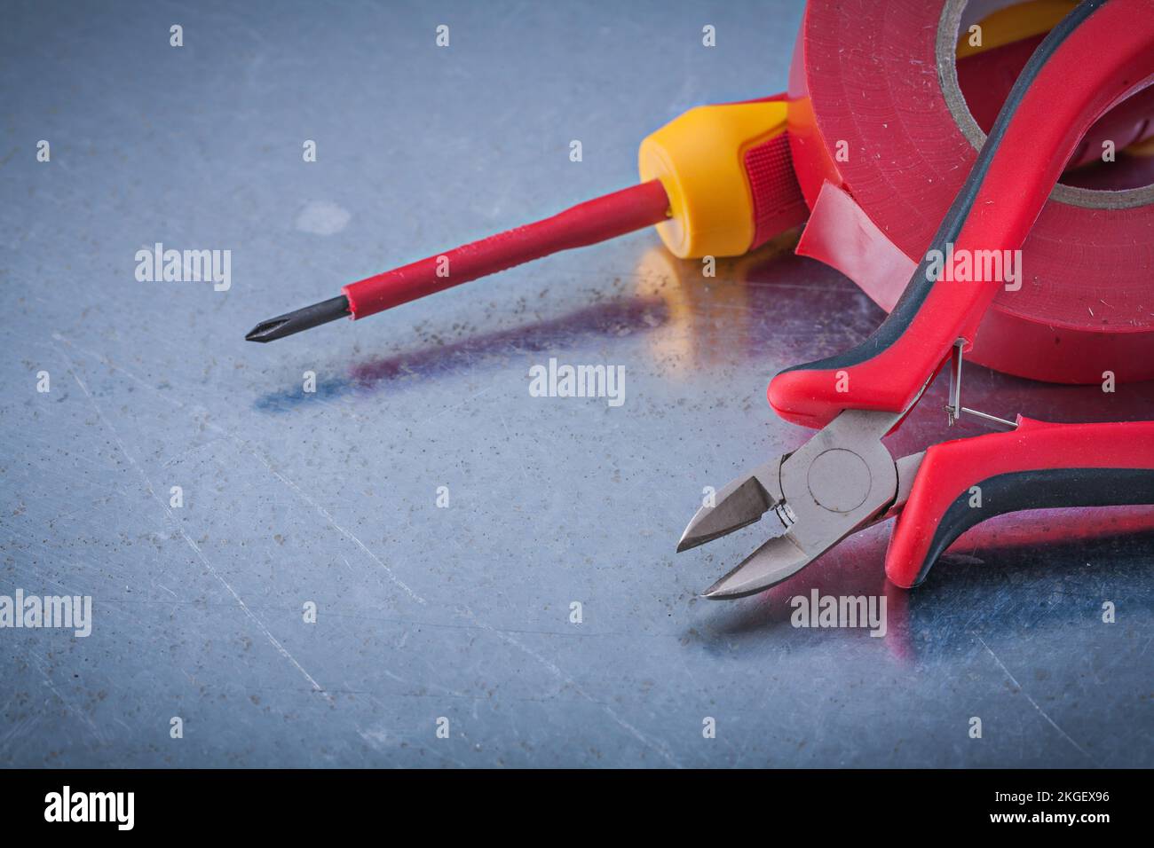 Red insulating tape nippers insulated screwdriver construction concept ...