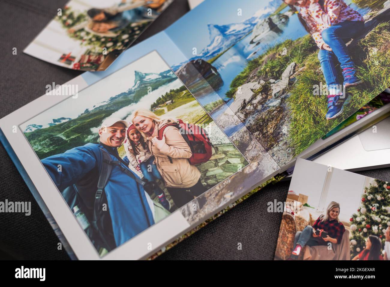 Laptop with photo, photoalbum, album Stock Photo - Alamy