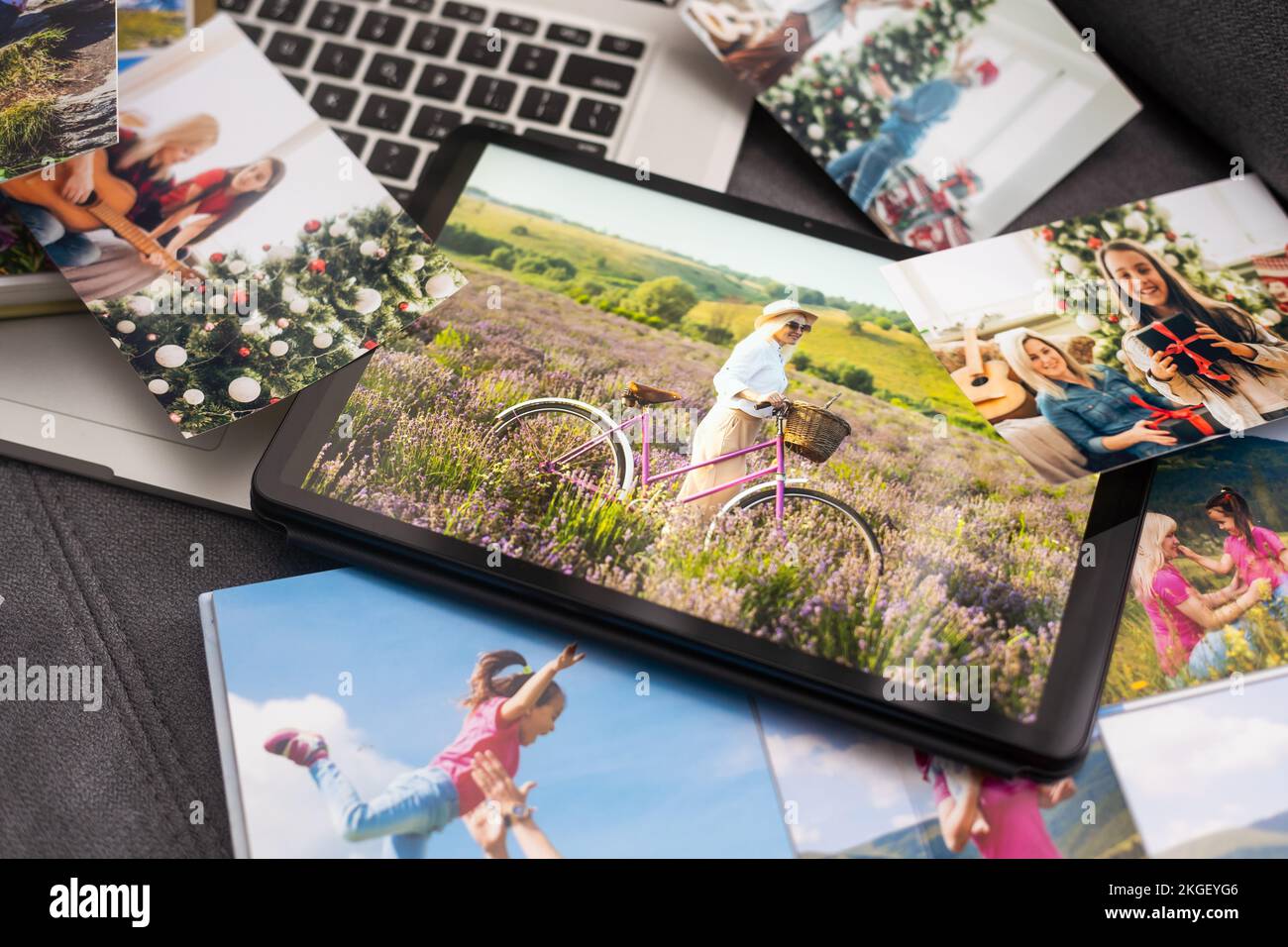 Laptop with photo, photoalbum, album Stock Photo - Alamy