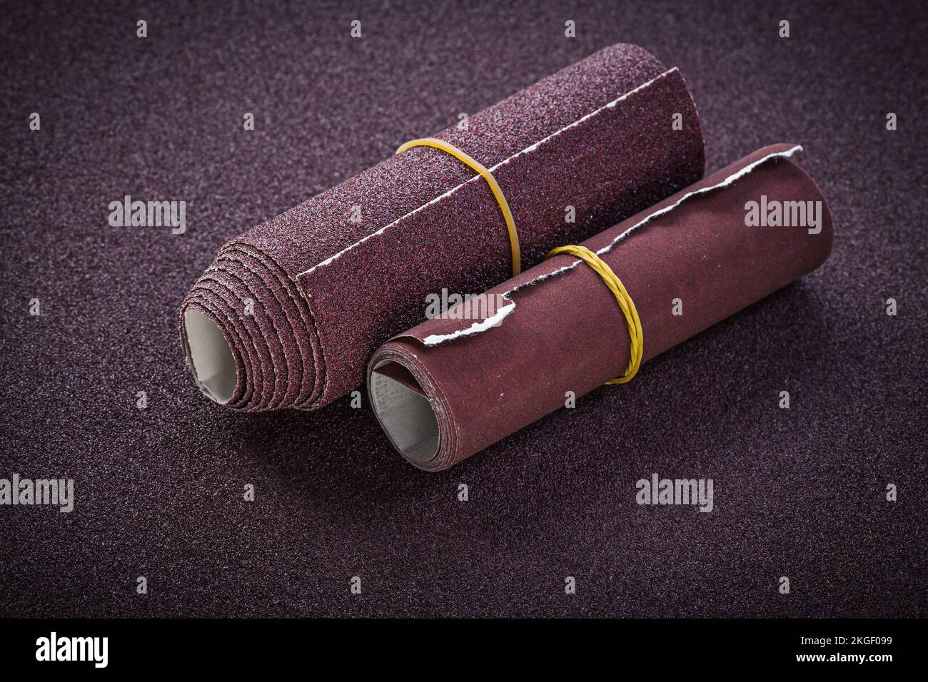 Rolled emery paper top view abrasive tools Stock Photo - Alamy