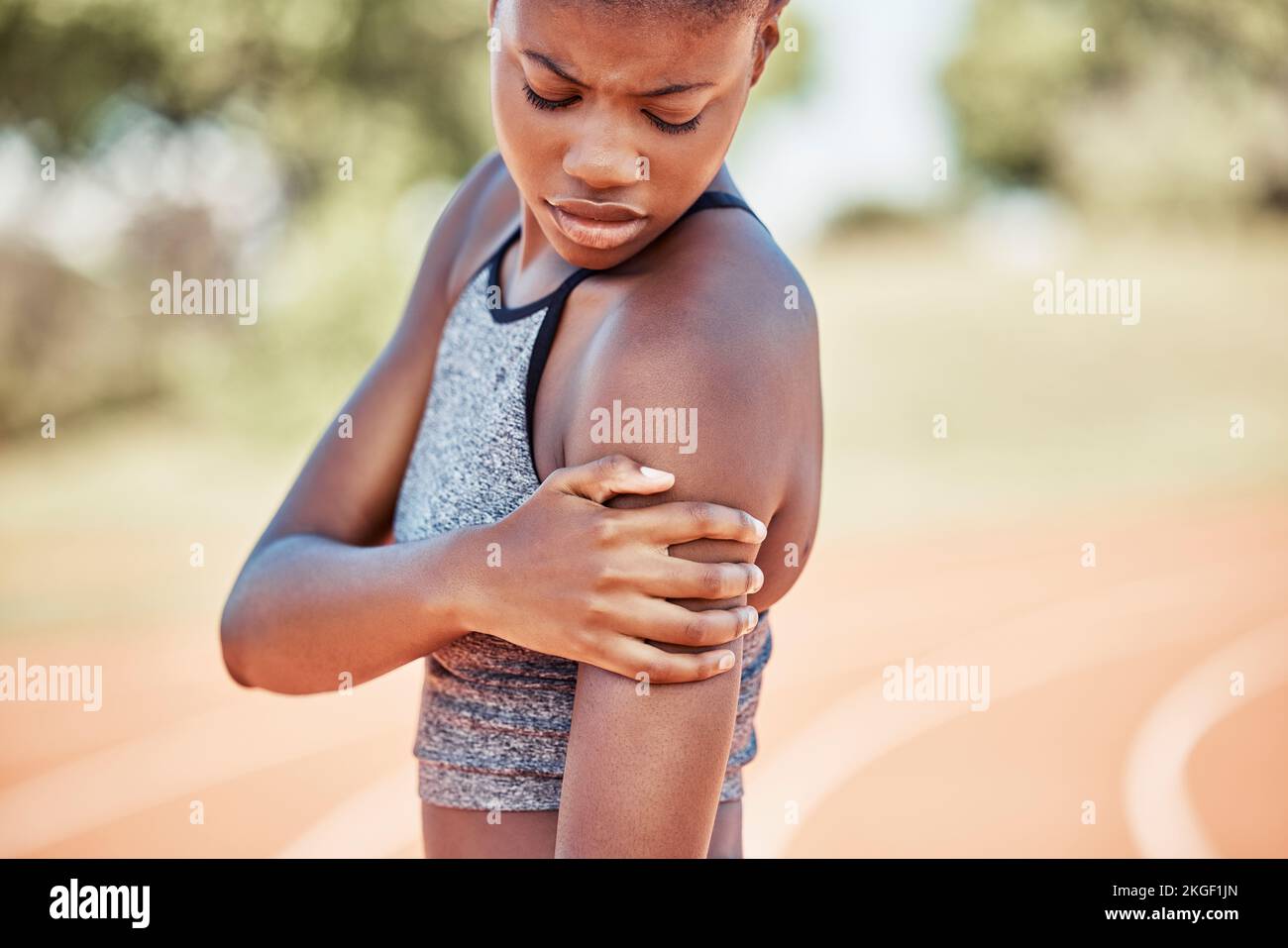 Arm injury, fitness and black woman runner after training, exercise and ...