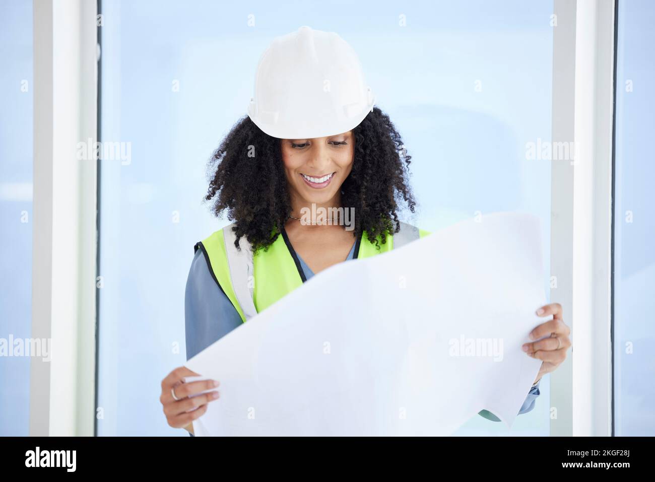 Architect, engineer or woman with paper in hand for blueprints ...