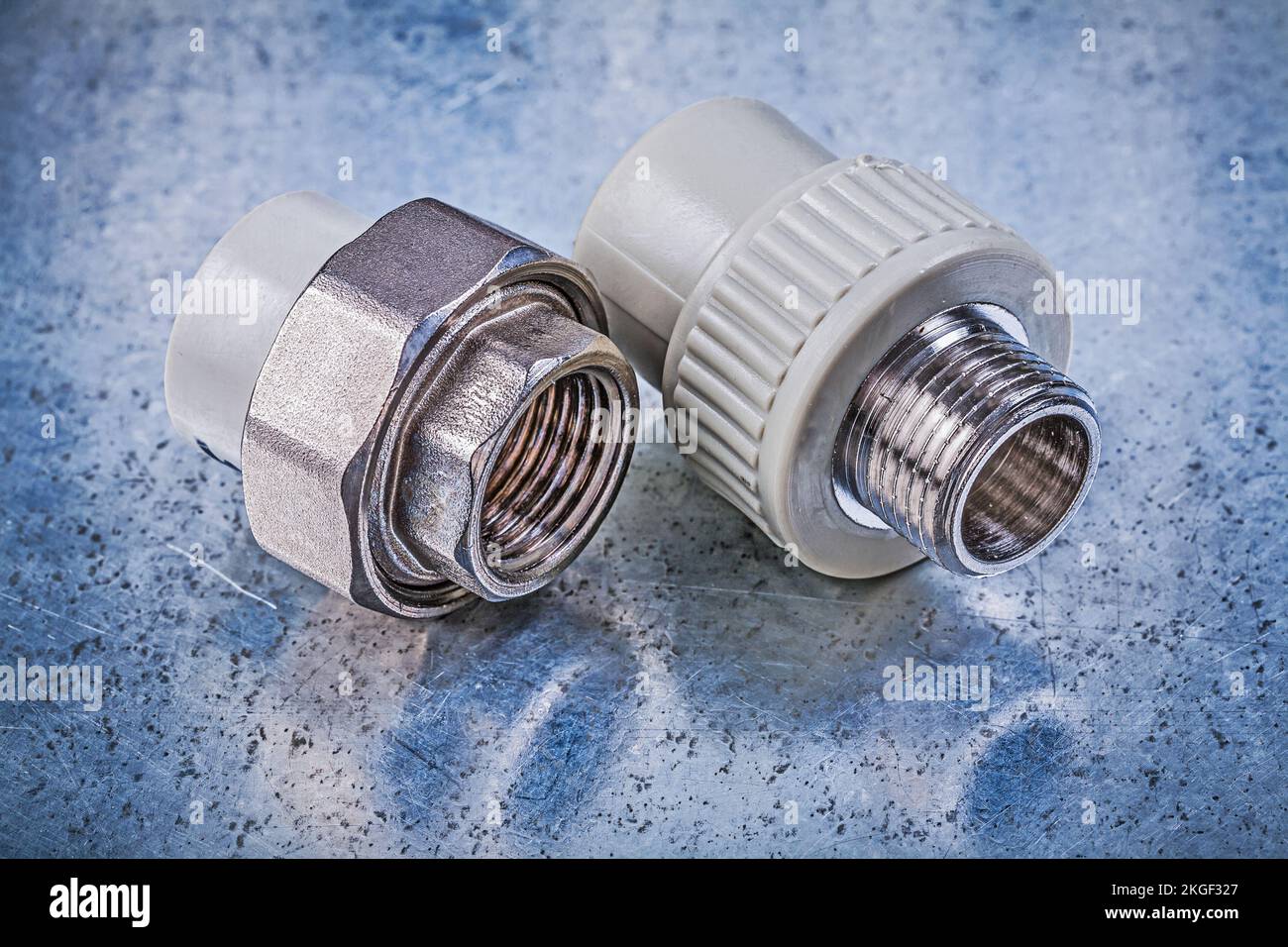 Screw-thread pipe connectors on metallic background construction ...