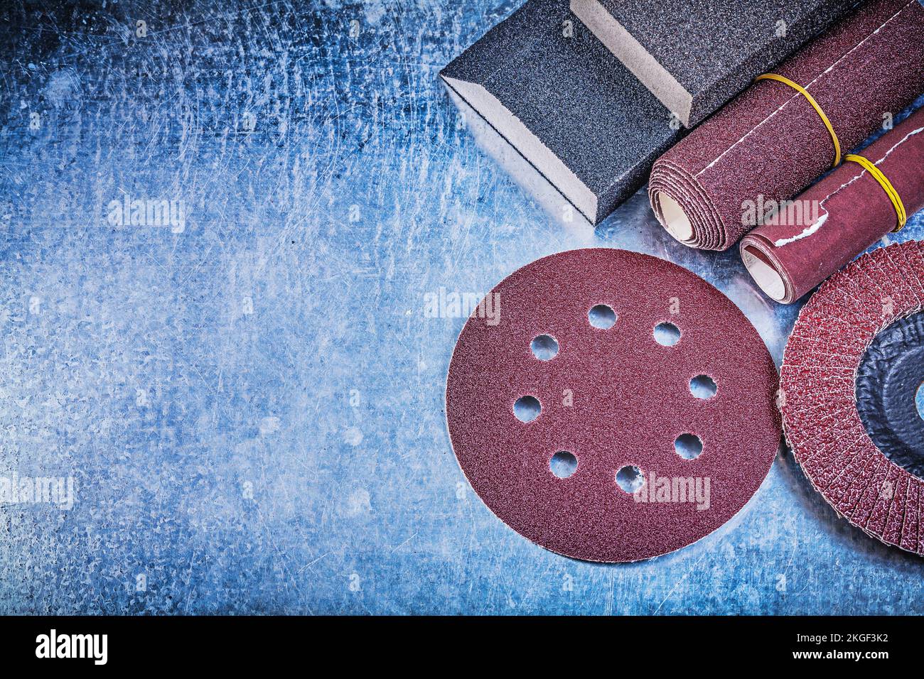 Set of abrasive tools on metallic background Stock Photo - Alamy