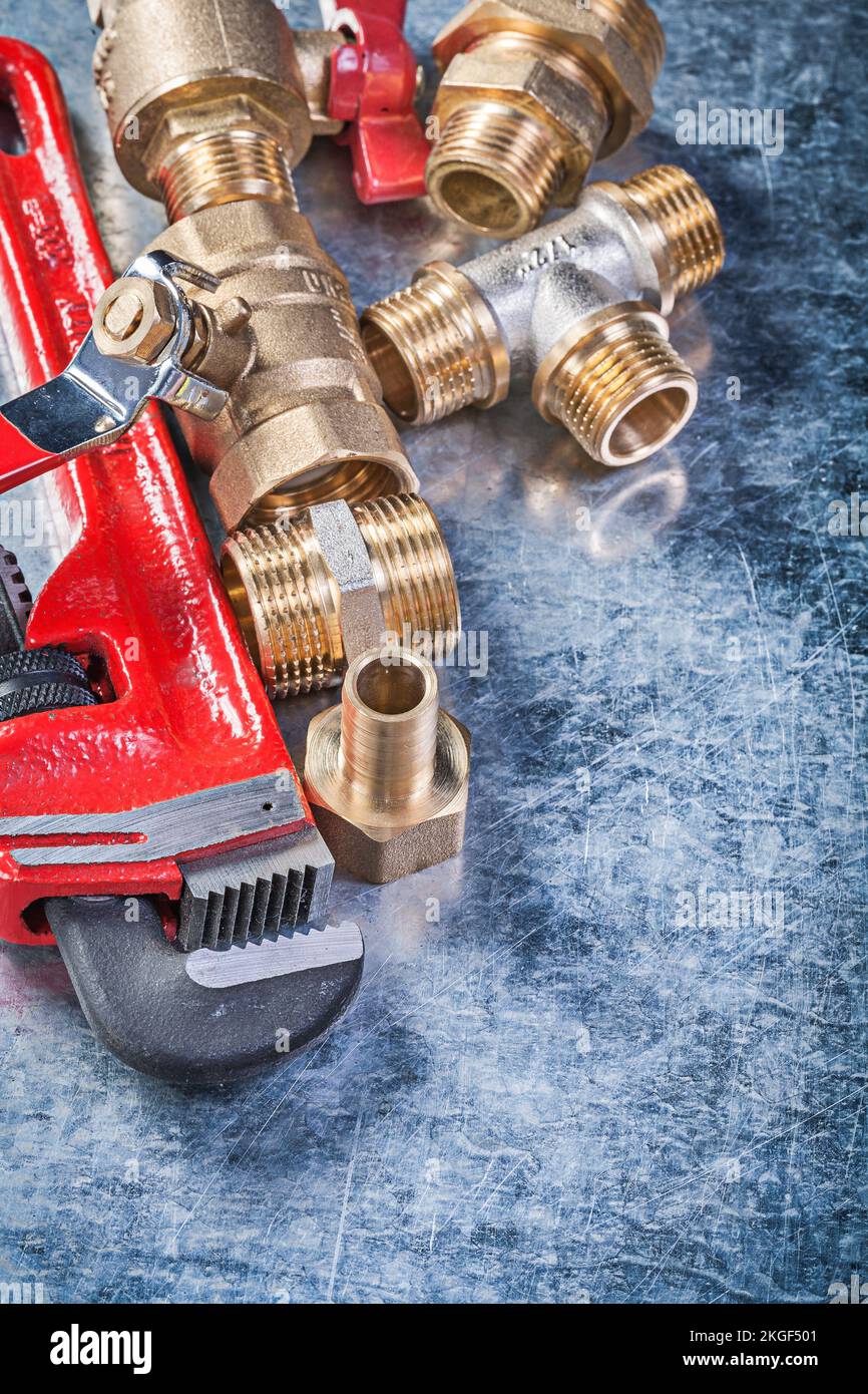 Set of plumbing hardware on metallic background construction concept ...