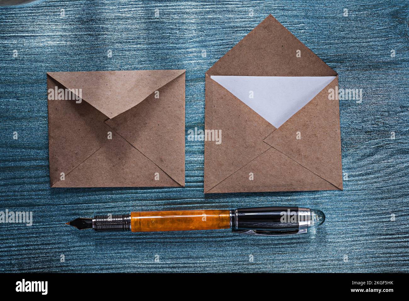 Set of retro post envelopes fountain pen on wooden board Stock Photo ...