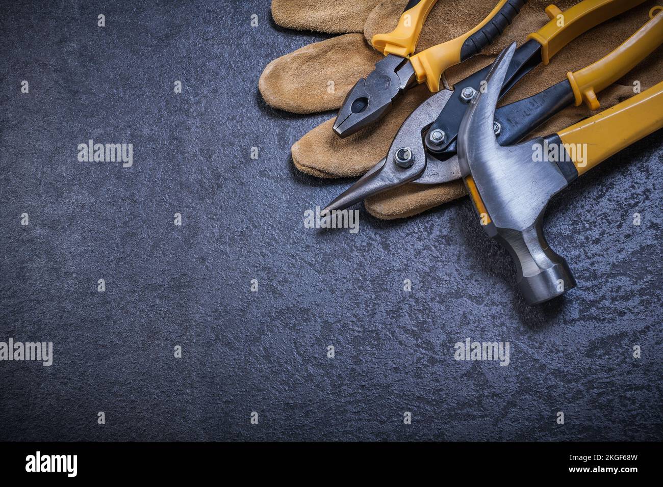 Sharp steel cutter pliers leather safety glove claw hammer Stock Photo ...