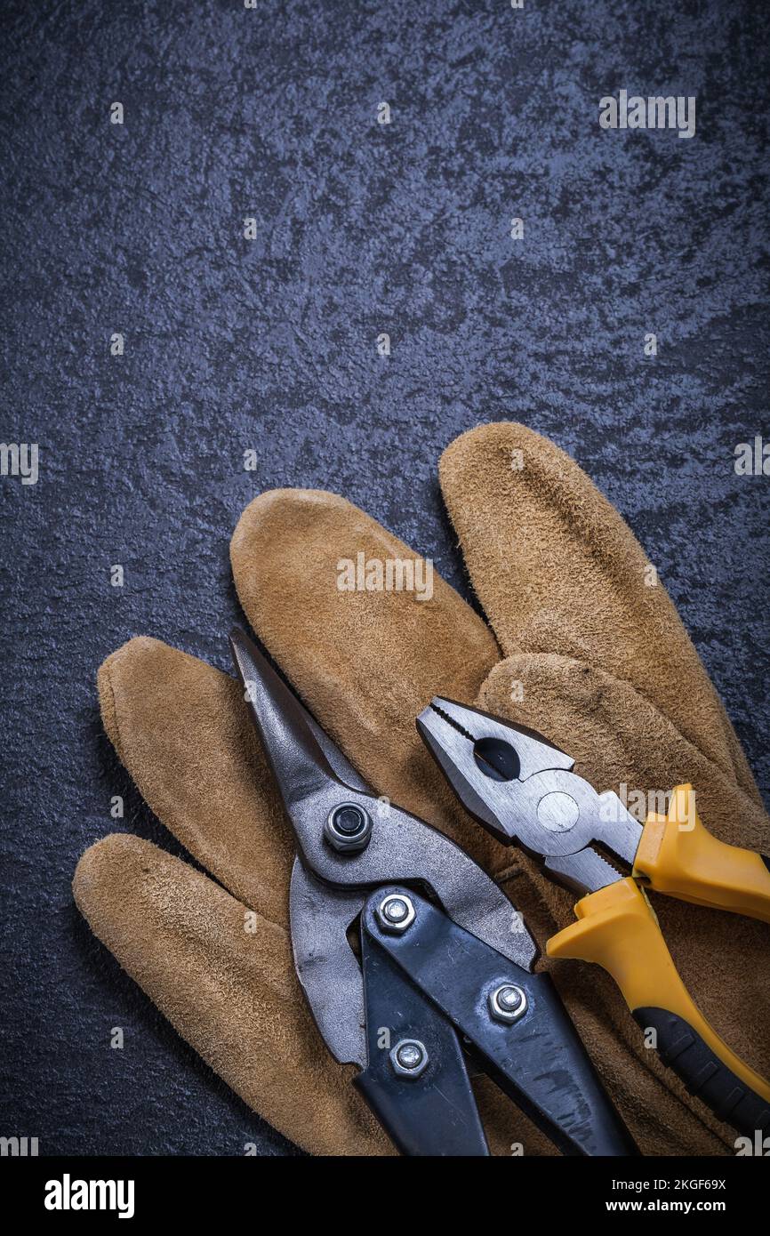 Sharp tin snips gripping tongs leather safety glove construction ...