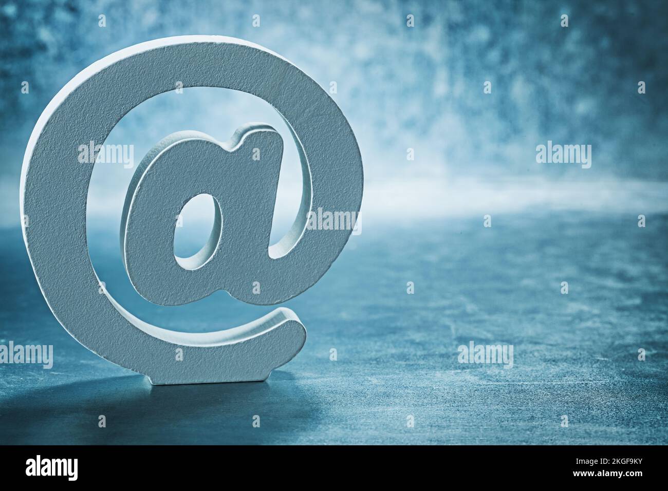 symbol of email on metalic background Stock Photo - Alamy