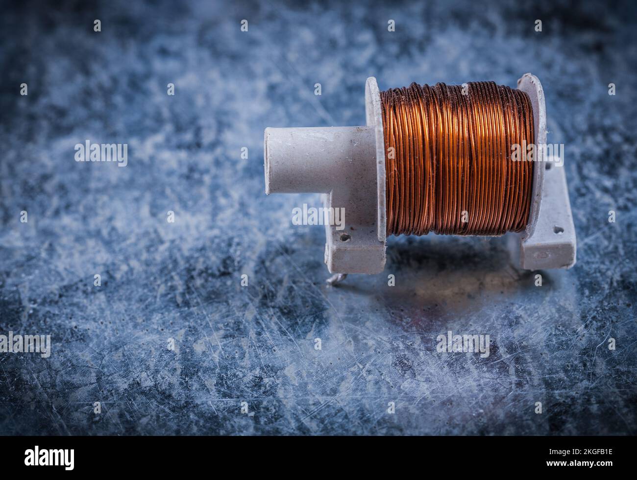 Transformer with copper wire on scratched metallic background Stock ...