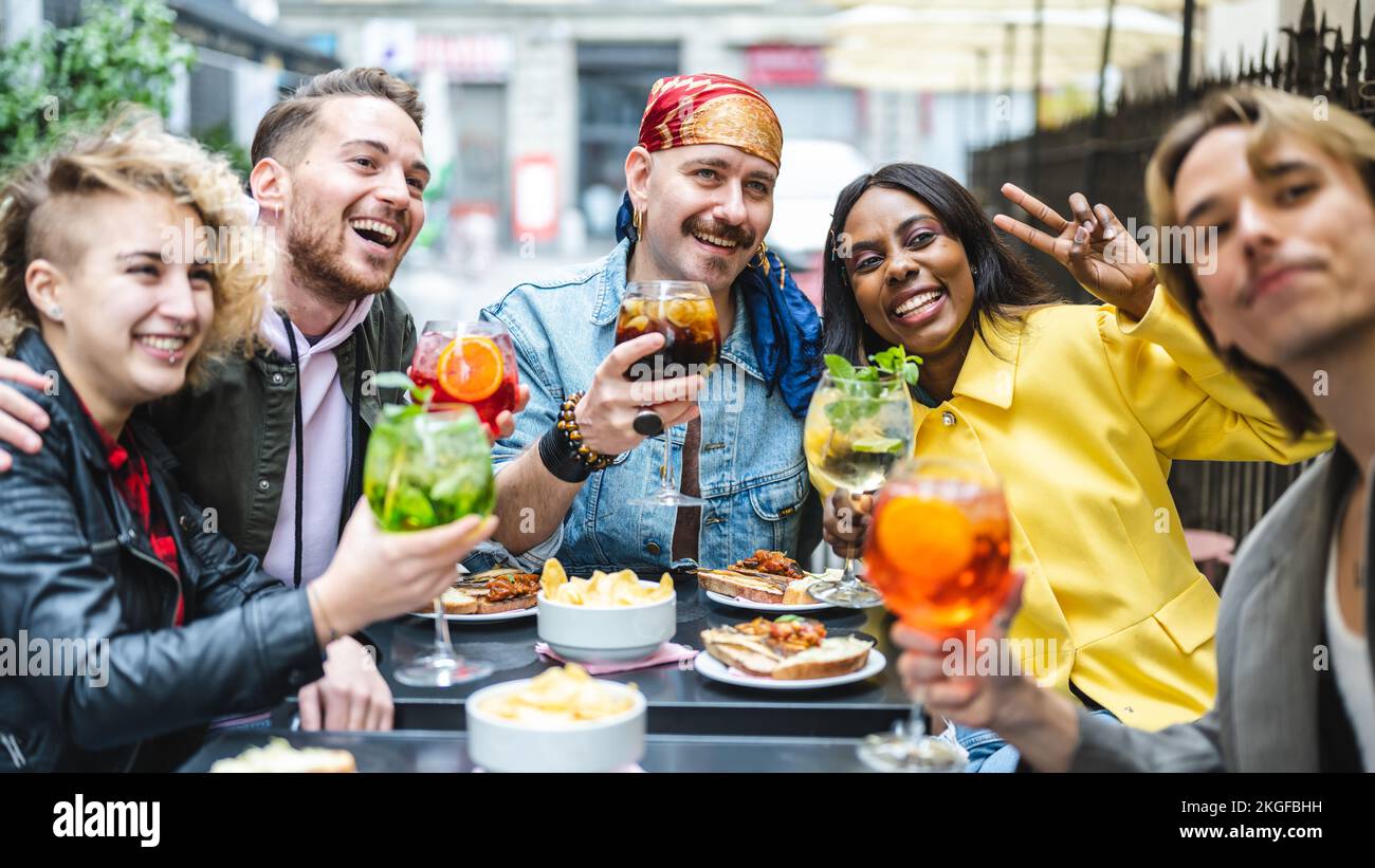 Lgbt group of diverse people sitting at bar, happy friends taking a ...