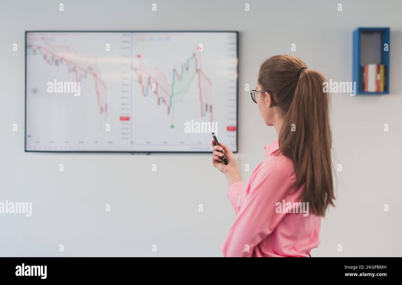 On Stage, Successful Female Speaker Presents Technological Product ...