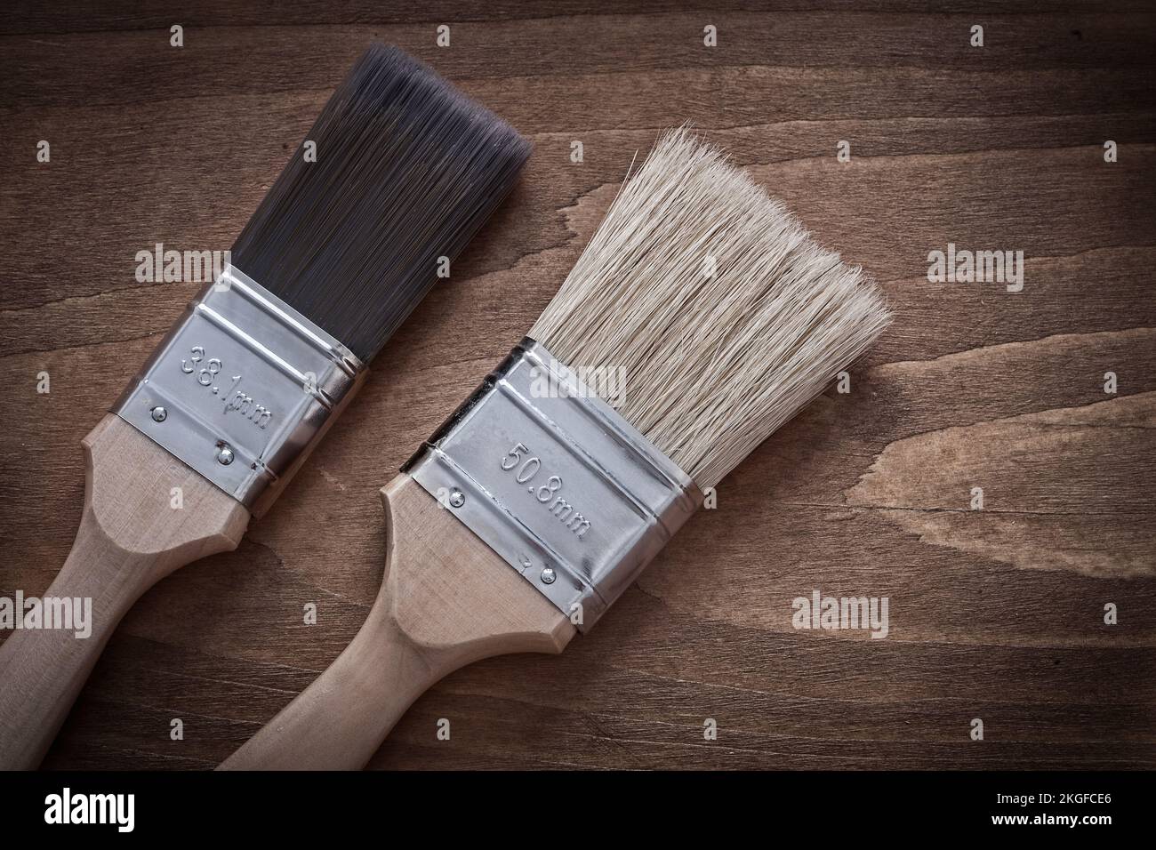 Two paint brushes with wooden handles and bristle horizontal view Stock ...