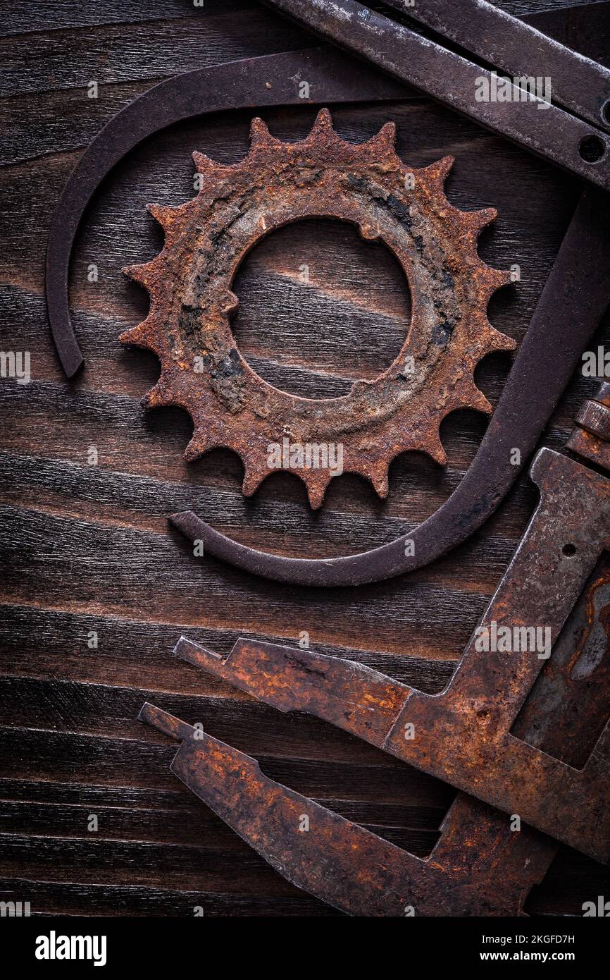 Vertical version of rusty measuring calipers with gear wheel on vintage ...