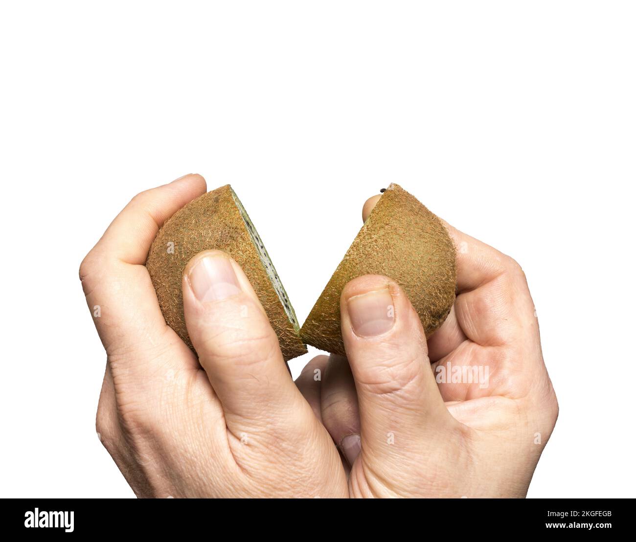 a kiwi cut in hand on a transparent background Stock Photo - Alamy